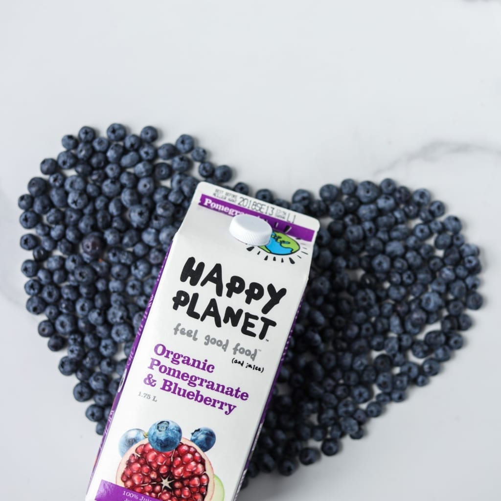 Jus de grenade et bleuet biologiques | Jus de fruits bio | Happy Planet ...